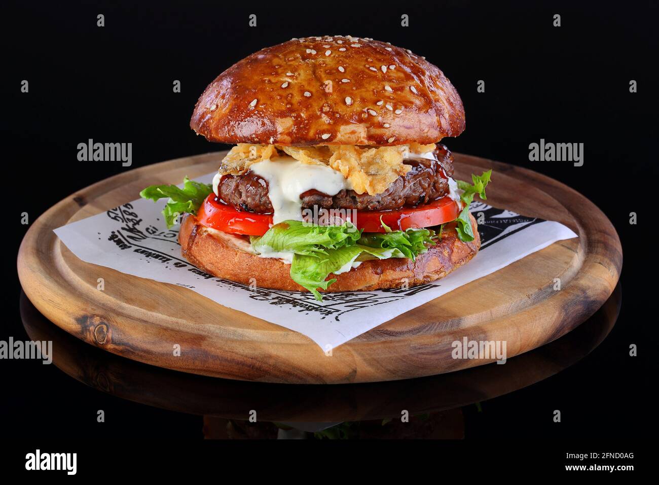 Grilled burger with meat patty, tomato and cheese Stock Photo - Alamy