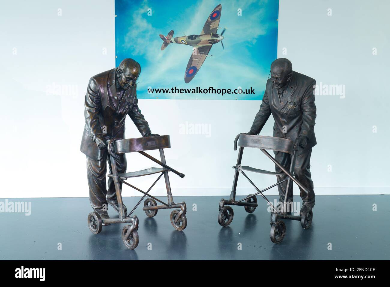 Bronze & resin statues of the late Sir Captain Tom Moore who raised ...