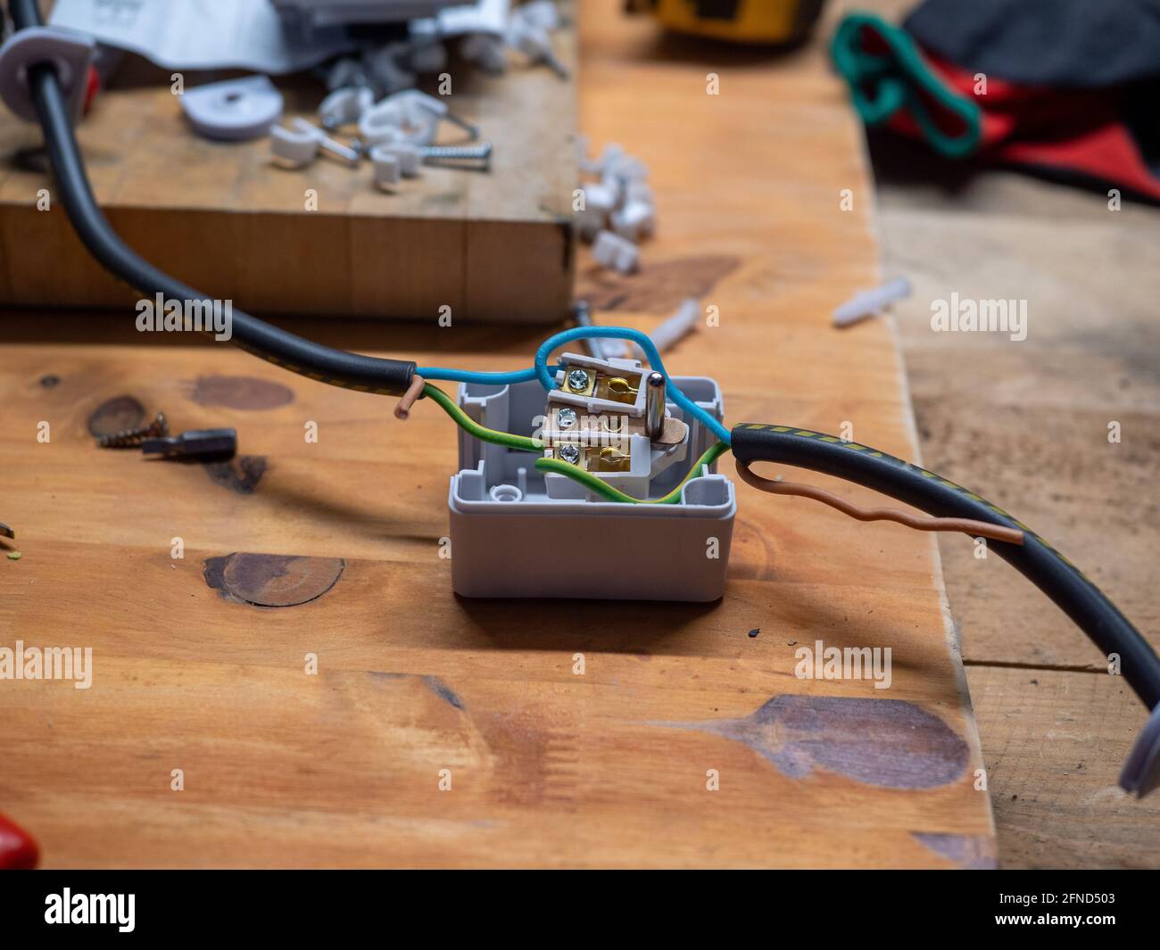 electric cables and outlet broken ready for repair Stock Photo - Alamy