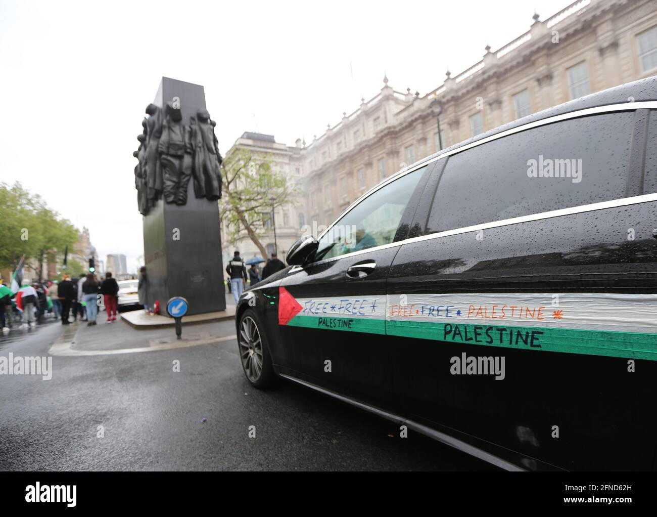 London, England, UK. 16th May, 2021. Car convoy and protesters blocked ...