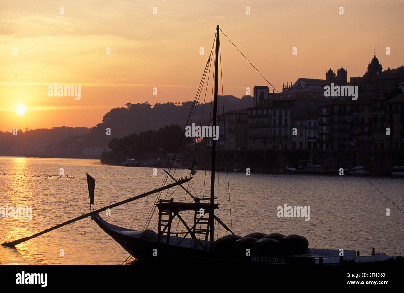 Rabelo boat in Douro river at sunset from Vila Nova de Gaia, Portugal ...