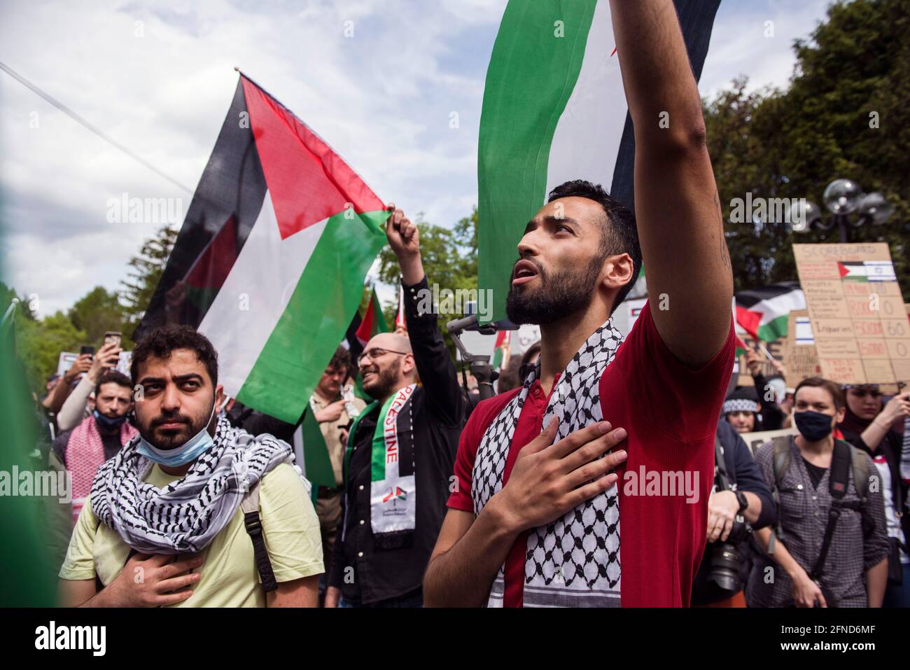 Warsaw, Poland. 16th May, 2021. A Palestinian protester listening to ...