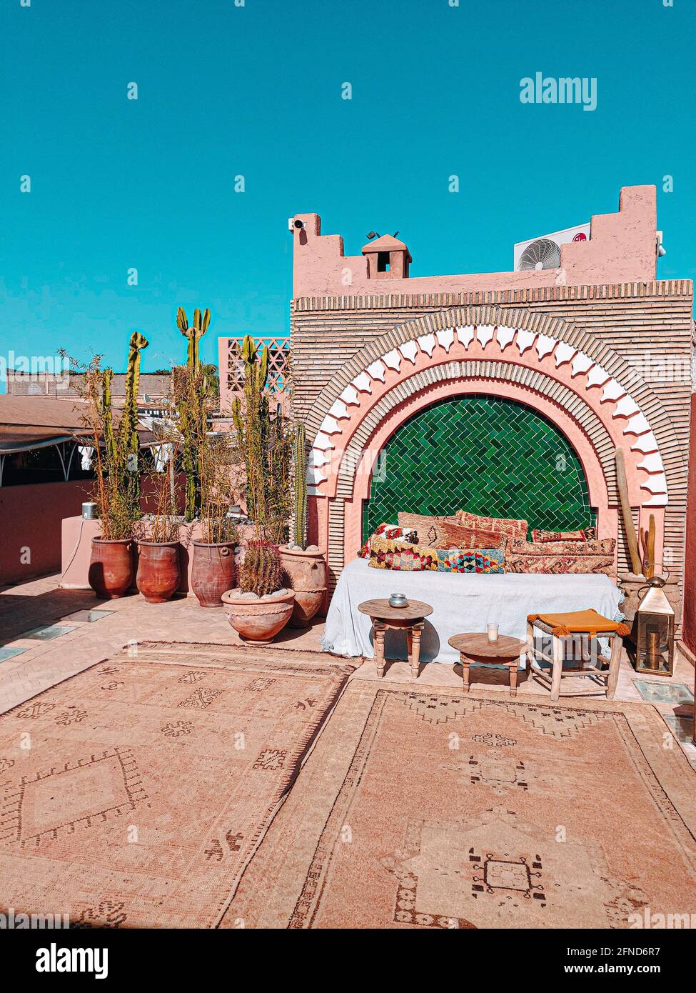 A traditional Moroccan rooftop riad under the clear blue sky Stock ...