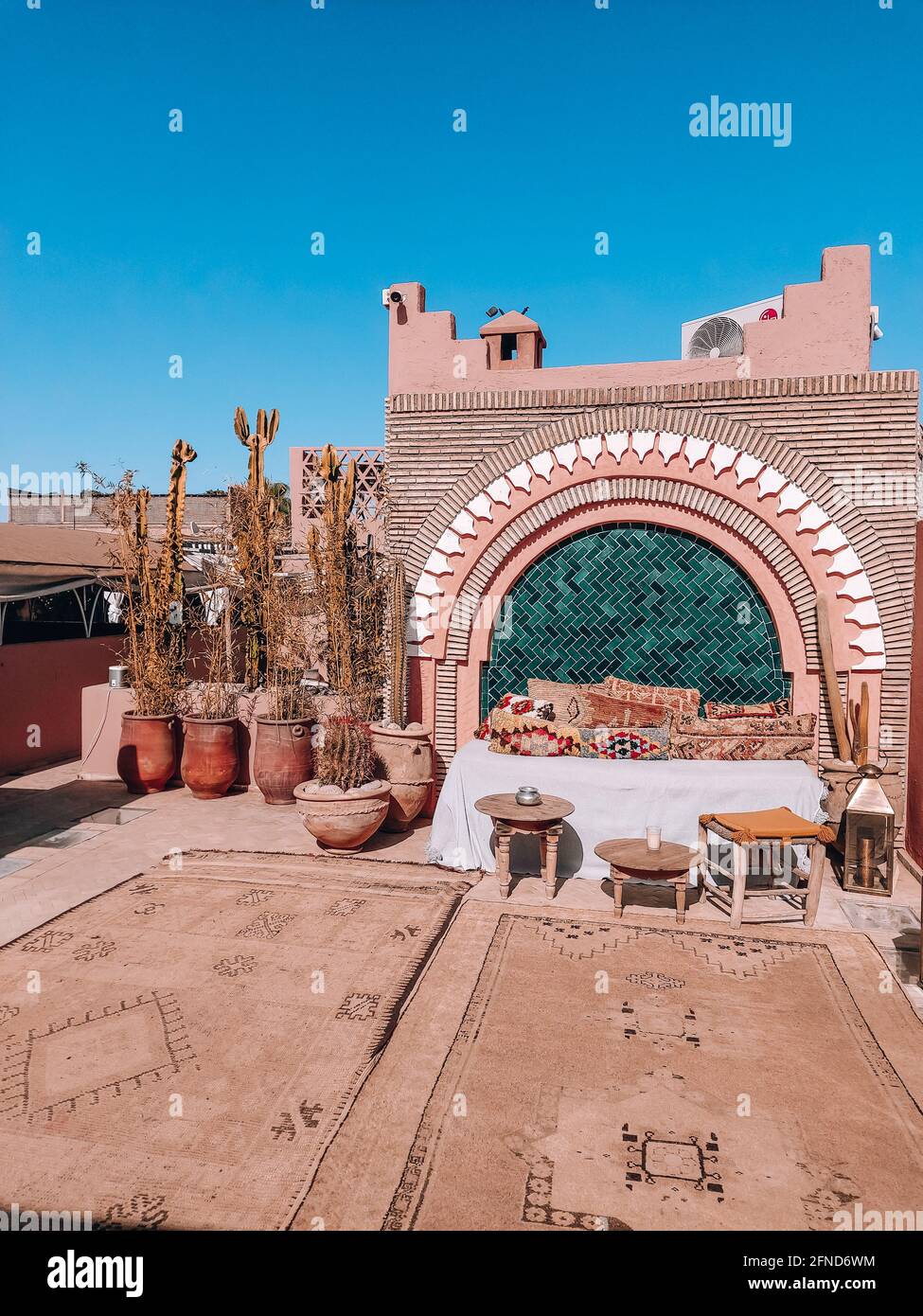 A traditional Moroccan rooftop riad under the clear blue sky Stock ...
