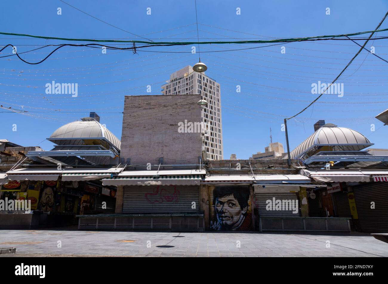 Side view of Mahane Yehuda street stalls at Mahane Yehuda Market during ...