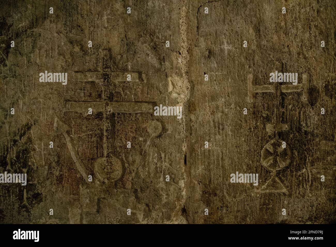 Relief of two crosses at a wall of the Church of the Holy Sepulchre of ...