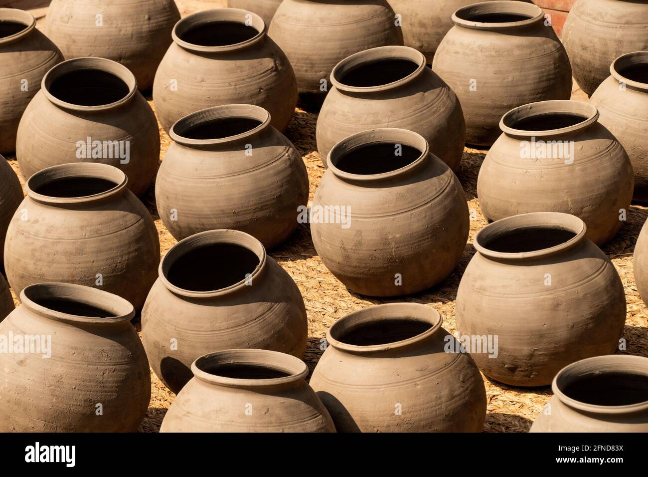 Pottery drying in the sun in Kathmandu, Nepal Stock Photo - Alamy