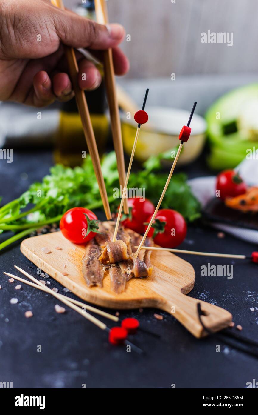 Tomato anchovy salad hi-res stock photography and images - Alamy