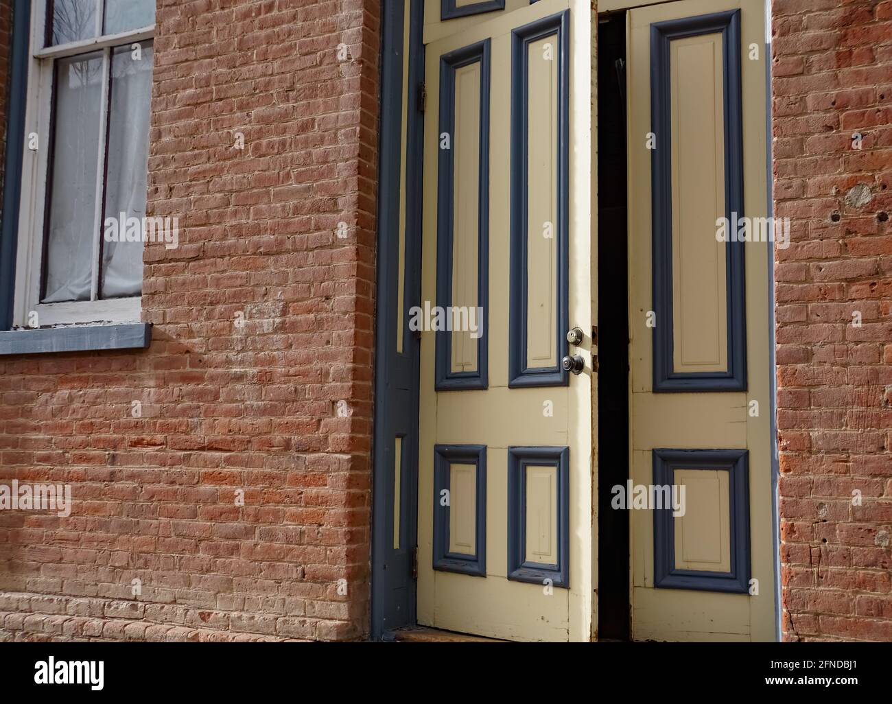 Open Door of Brick Building Stock Photo - Alamy