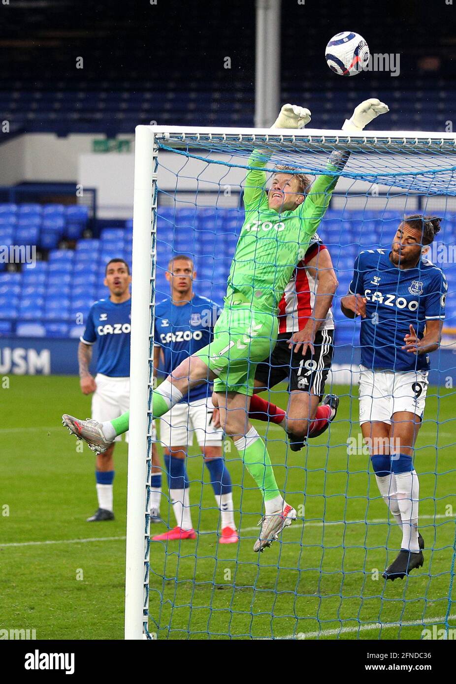 Everton goalkeeper Jordan Pickford makes a save during the Premier ...