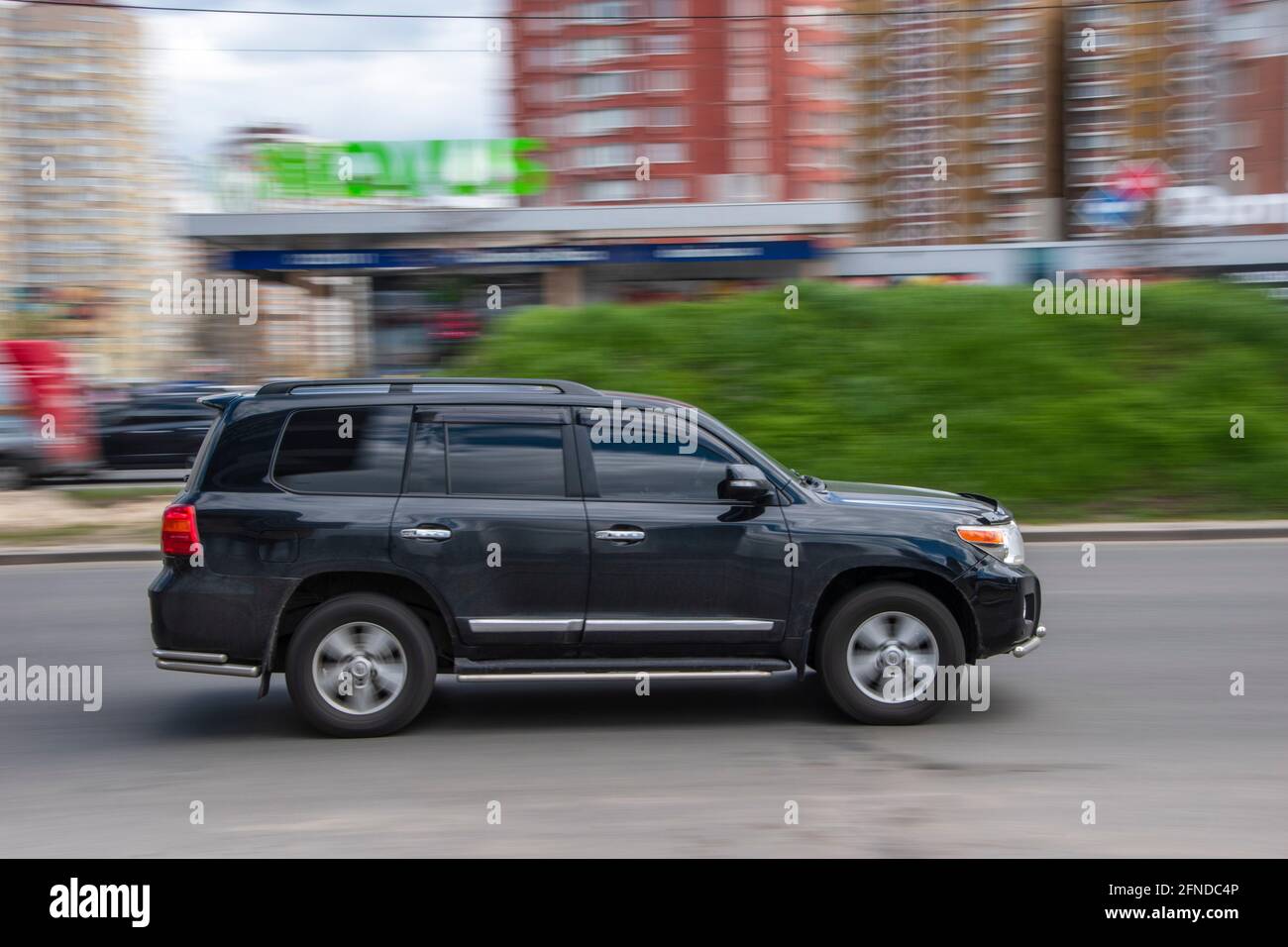 Ukraine, Kyiv - 26 April 2021: Black Toyota Land Cruiser car moving on ...
