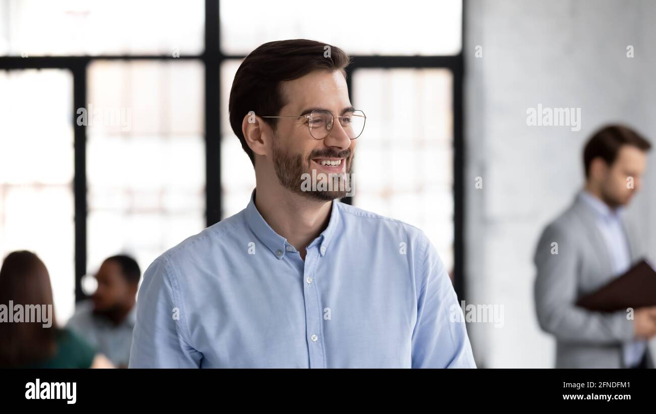 Portrait of happy successful business startup leader wearing glasses ...