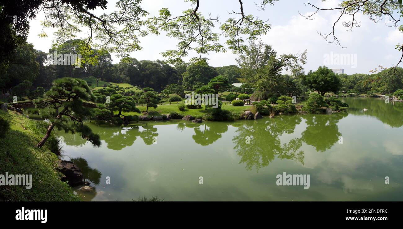 Japanese zen garden lake landscape reflection of trees in water Pano ...