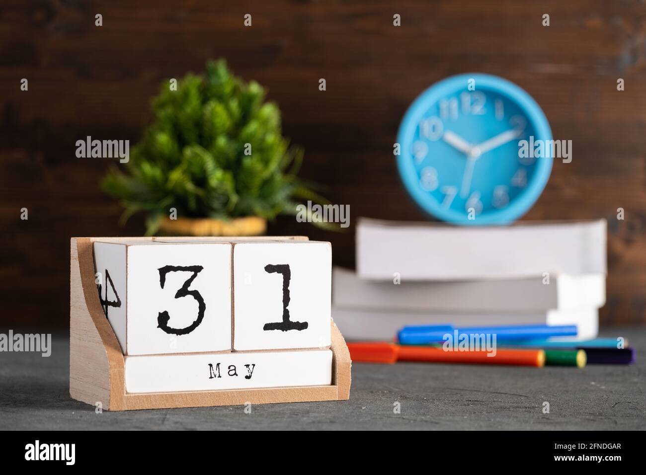 May 31st. May 31 wooden cube calendar with blur objects on background ...