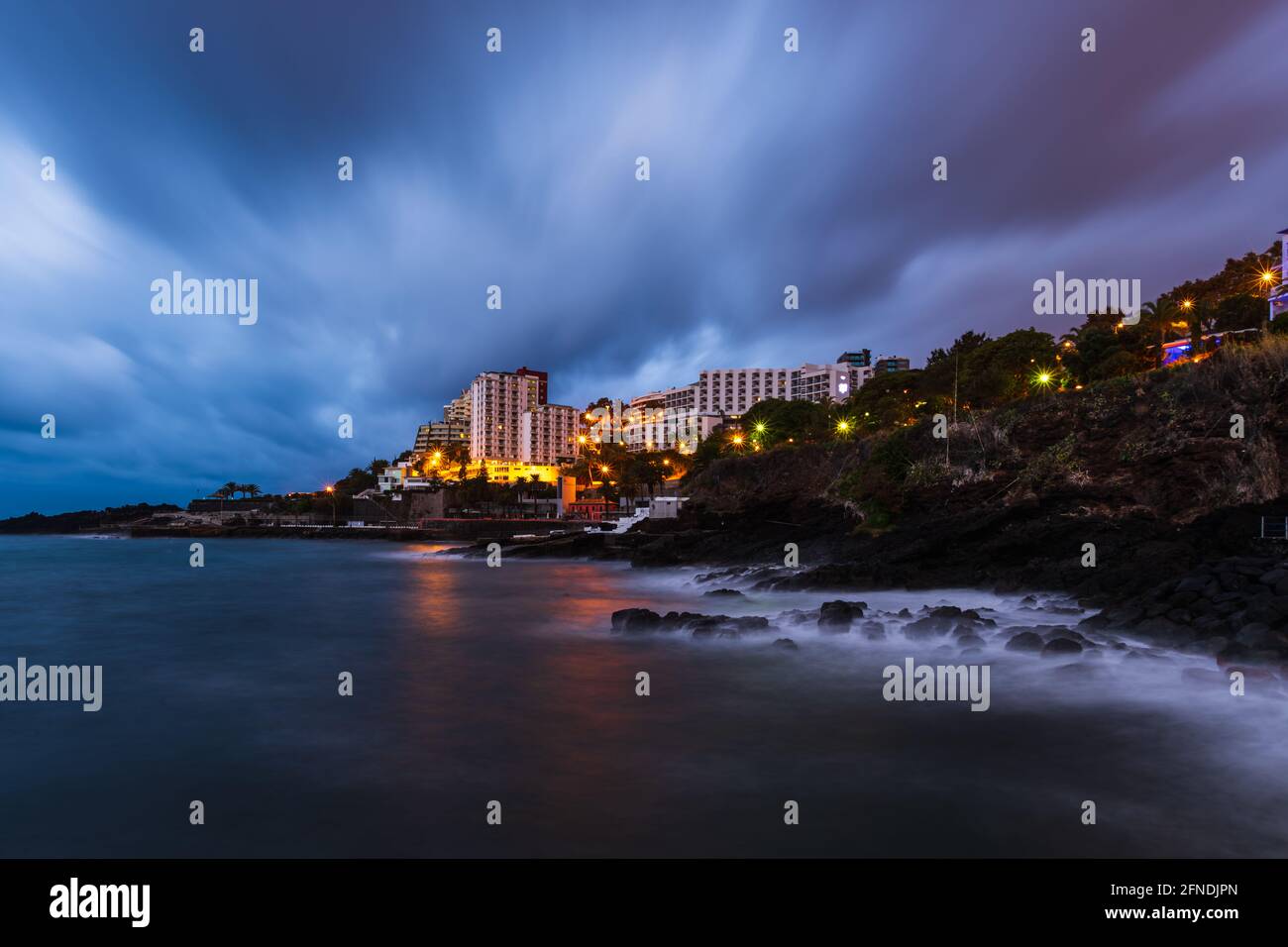 Coastal landscape in front of buildings Stock Photo - Alamy