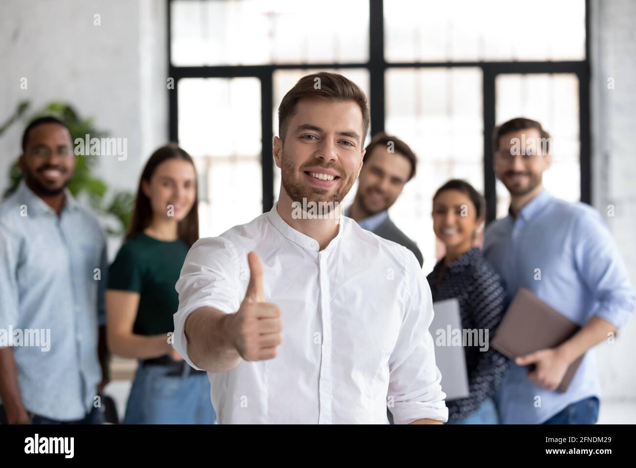 Happy employee satisfied with career and good job Stock Photo - Alamy
