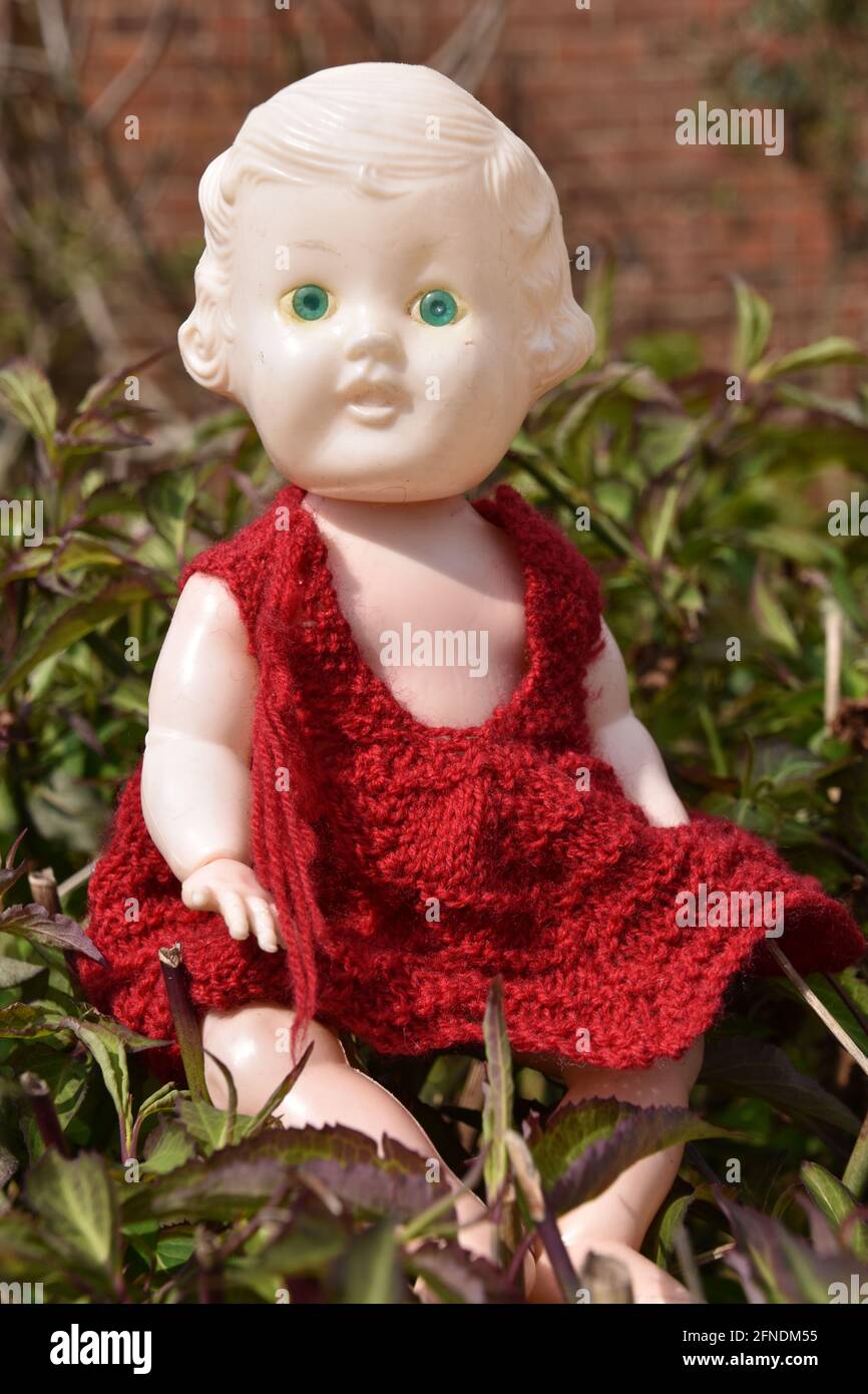 Doll red dress hi-res stock photography and images - Alamy