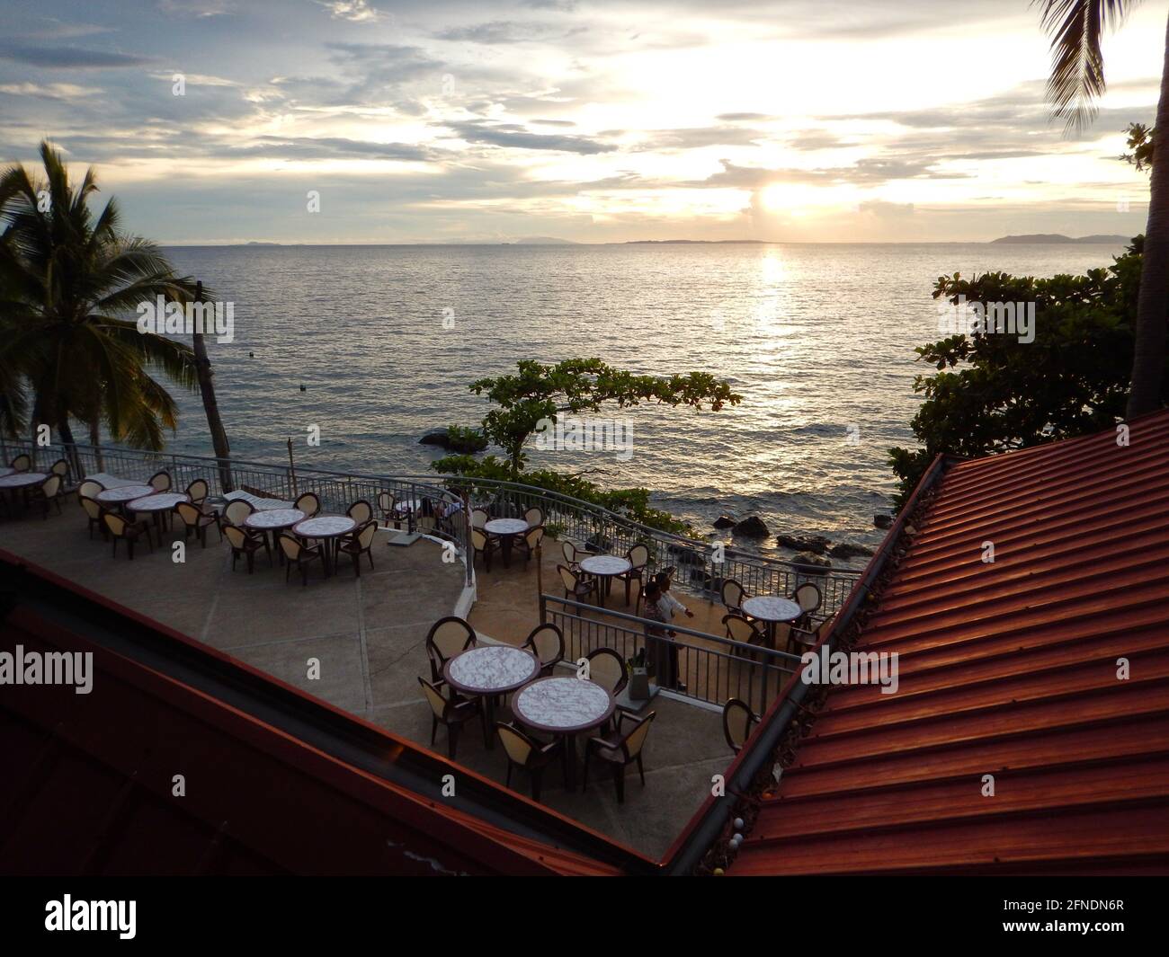 Sun setting over the Pacific ocean as seen from Eagle Point, Batangas ...