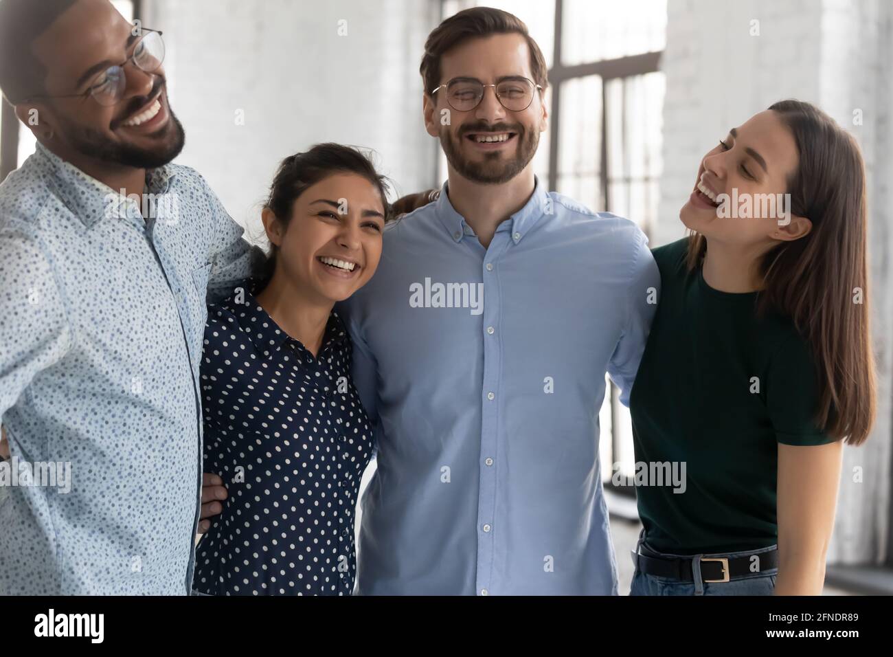 Happy diverse business team celebrating corporate success together ... Happy diverse business team celebrating corporate success together ...