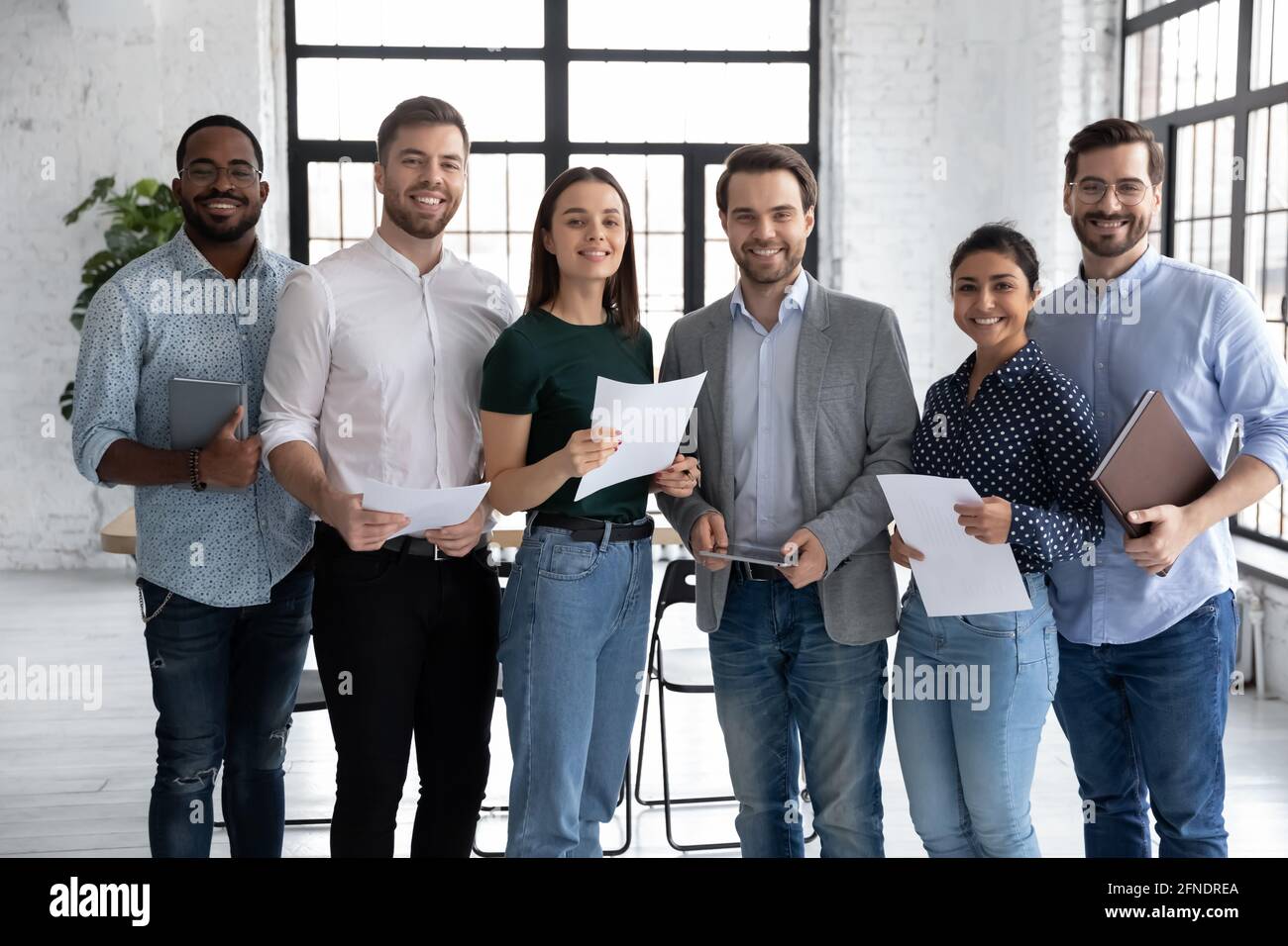 Portrait of happy diverse group of interns or students Stock Photo - Alamy
