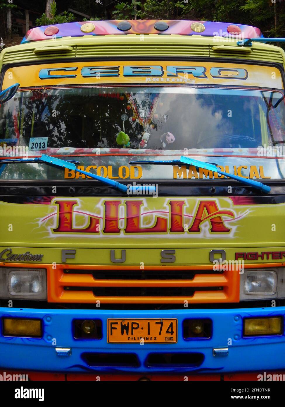 Lilia yellow and red decorated Jeepney in Mambukal Hot Spring Resort ...