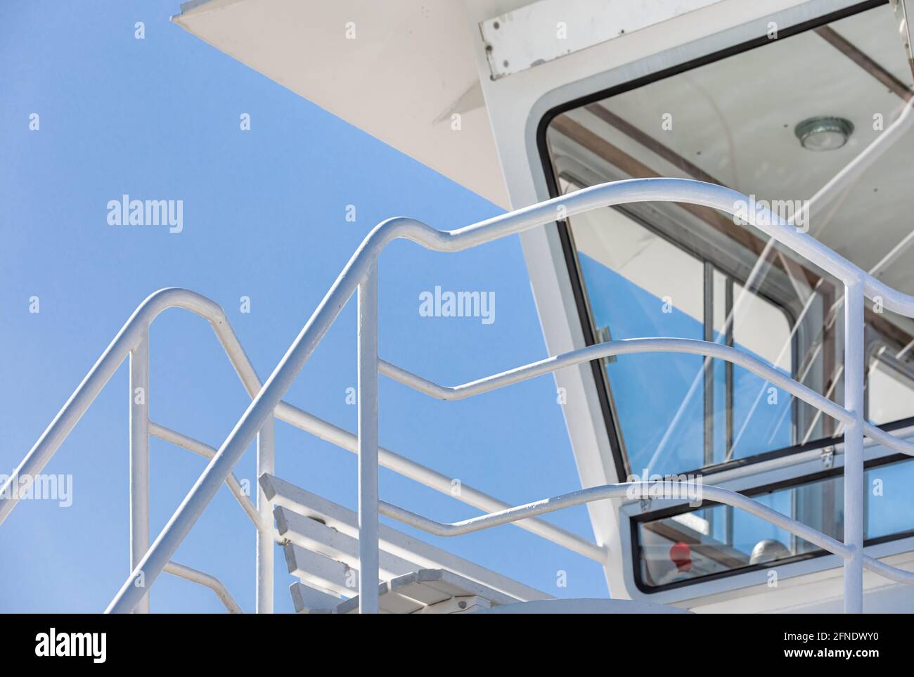 Detail of the railing and helm of the Shelter Island South Ferry Stock ...