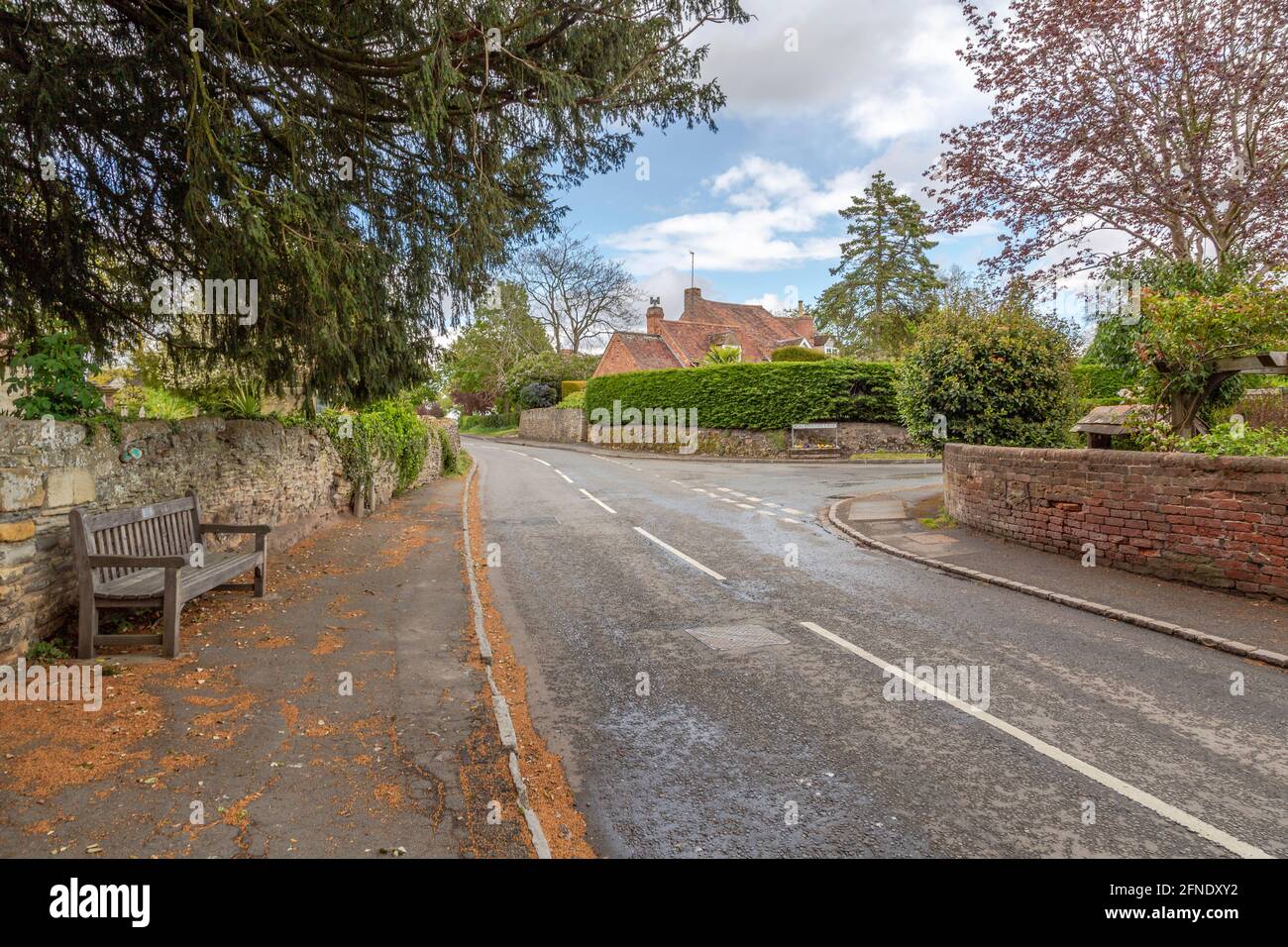 General view of Main Street in the Worcestershire village of Cropthorne ...