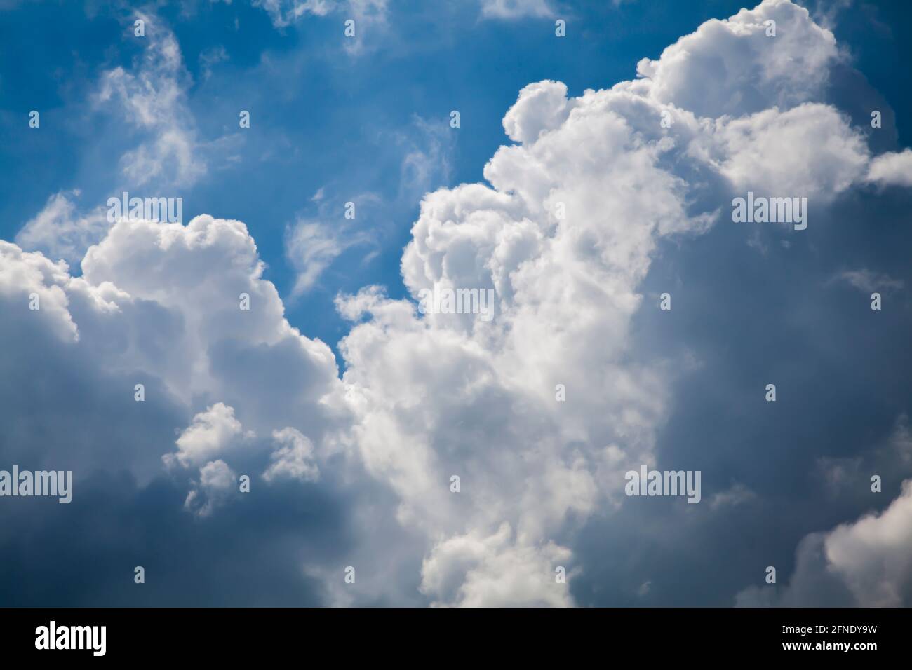 Sky deep blue with isolated white clouds hi-res stock photography and ...