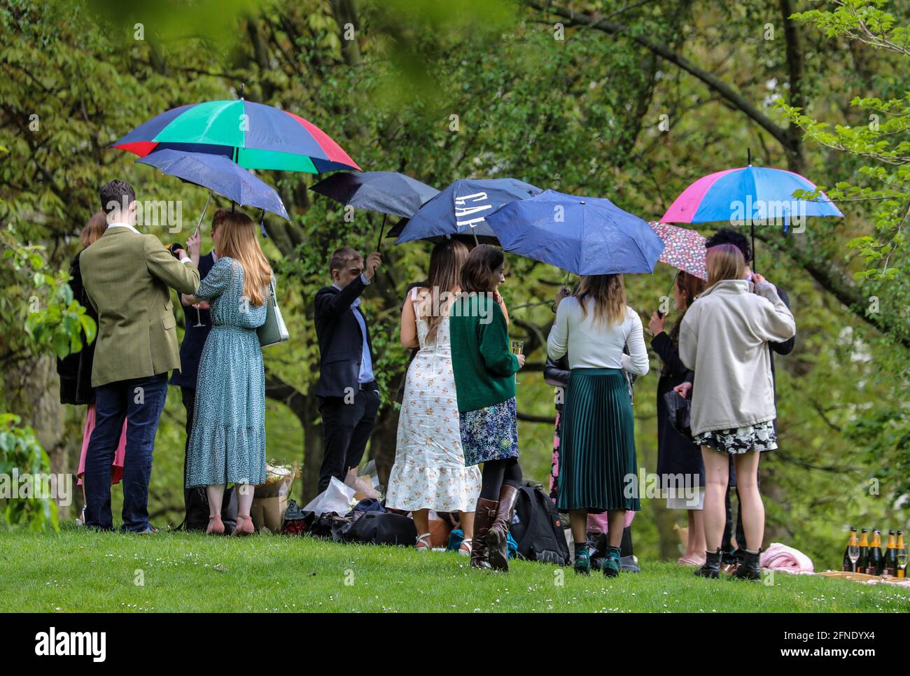 Holds umbrellas hi-res stock photography and images - Alamy