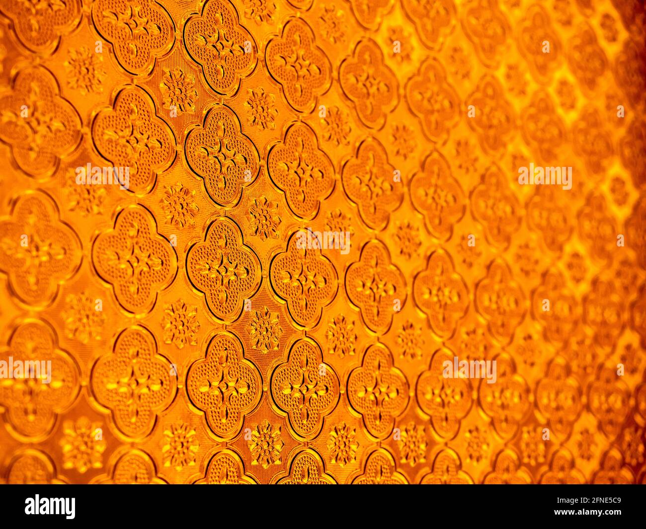Close up pattern surface and texture of red tinted glass window ...
