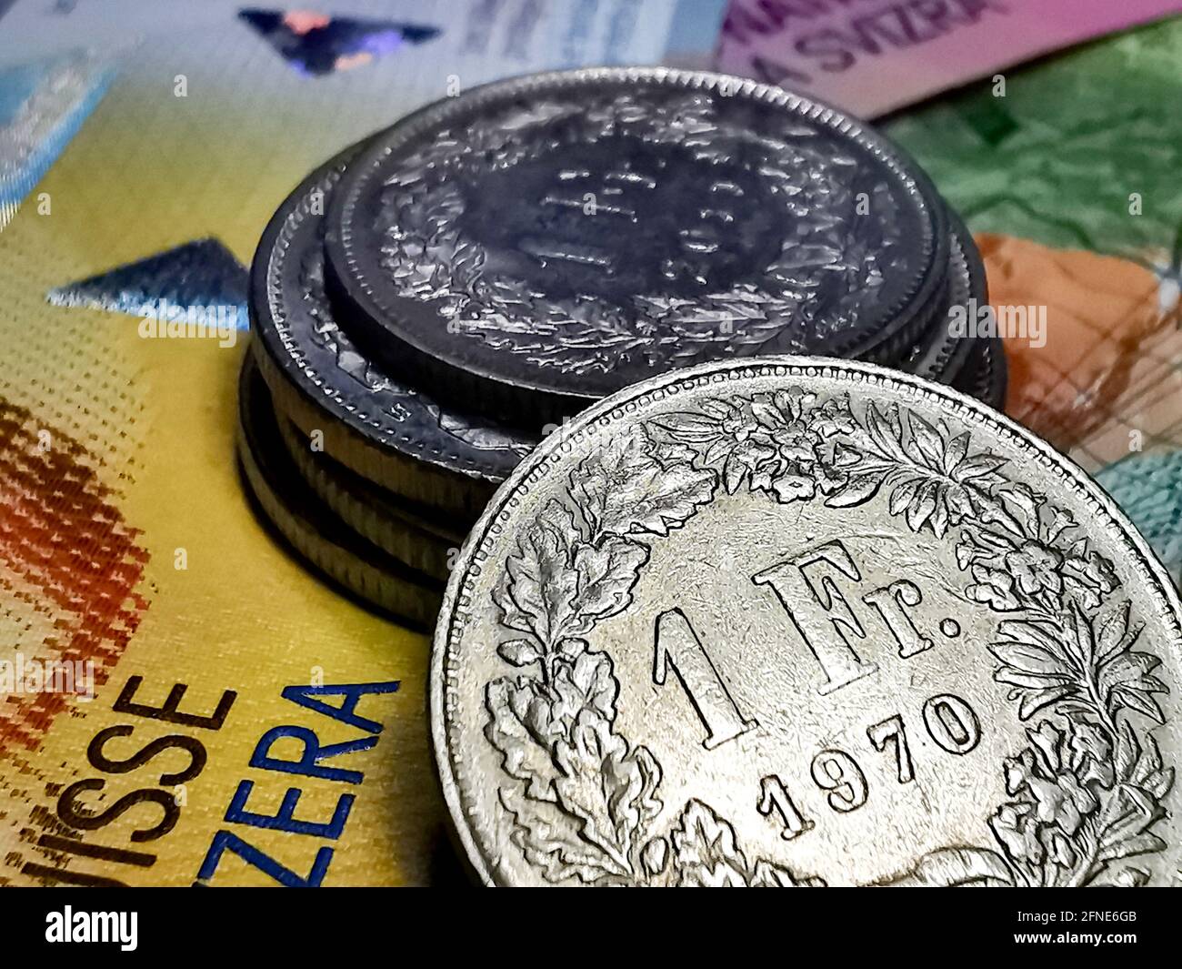 Coins and Swiss Francs banknotes Stock Photo - Alamy