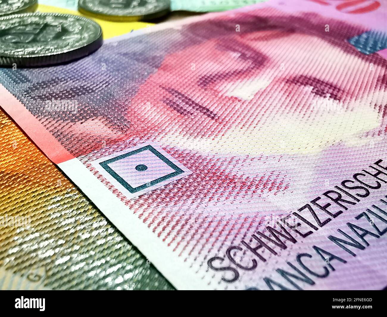 Coins and Swiss Francs banknotes Stock Photo - Alamy