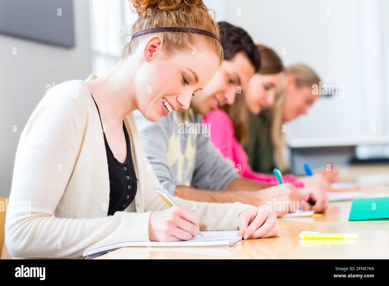 University college students writing test or exam Stock Photo - Alamy