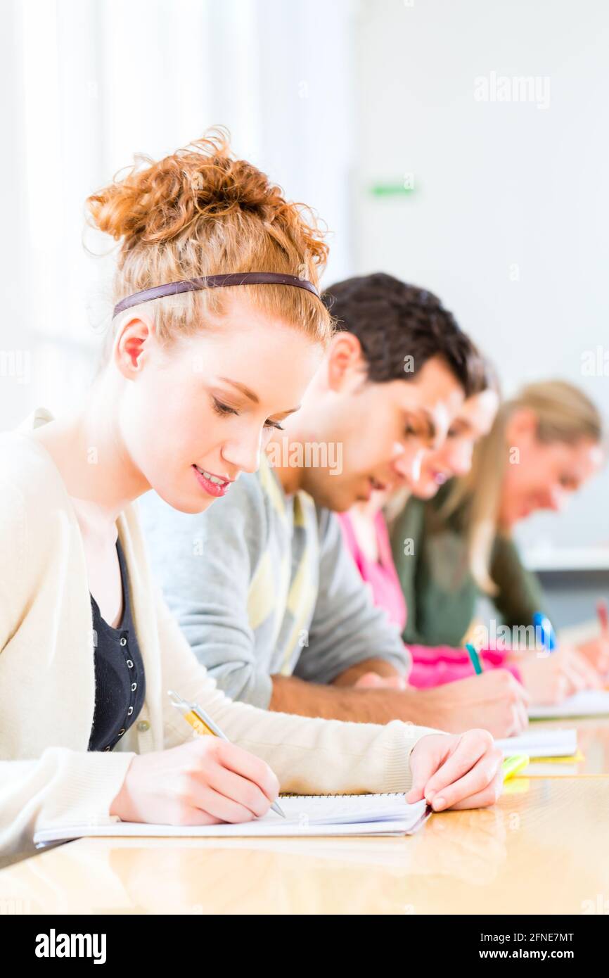 University college students writing test or exam Stock Photo - Alamy