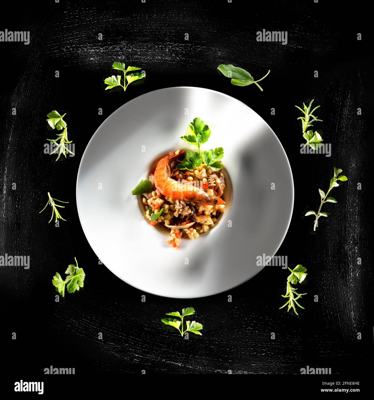 Fregola Sarda Pasta with seafood Stock Photo - Alamy