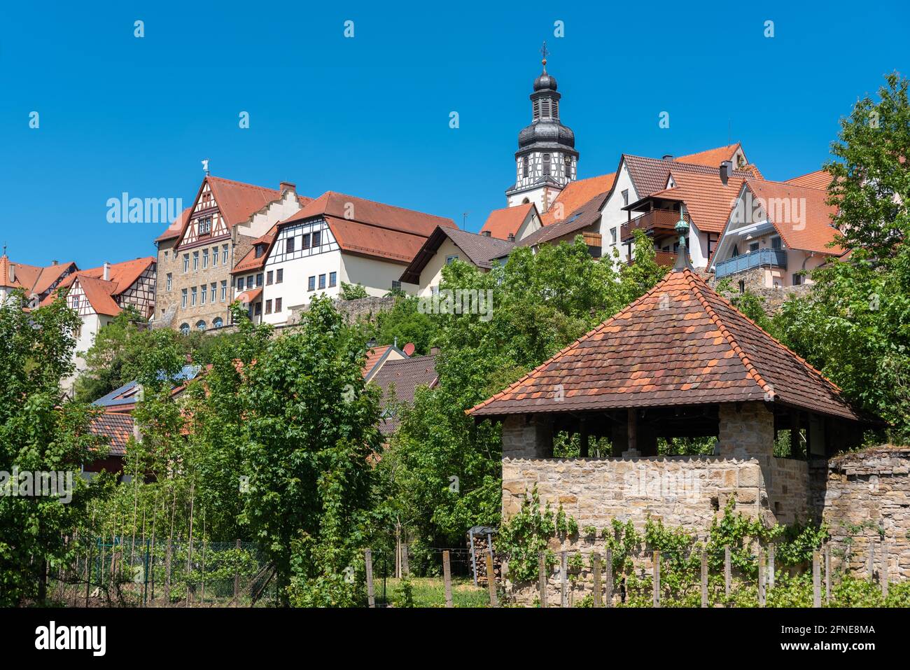 Townscape with historic town wall and Saint Martin Church, Gochsheim ...