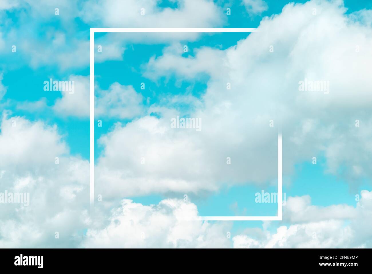 Blue sky with white clouds and a square frame, an abstract design ...