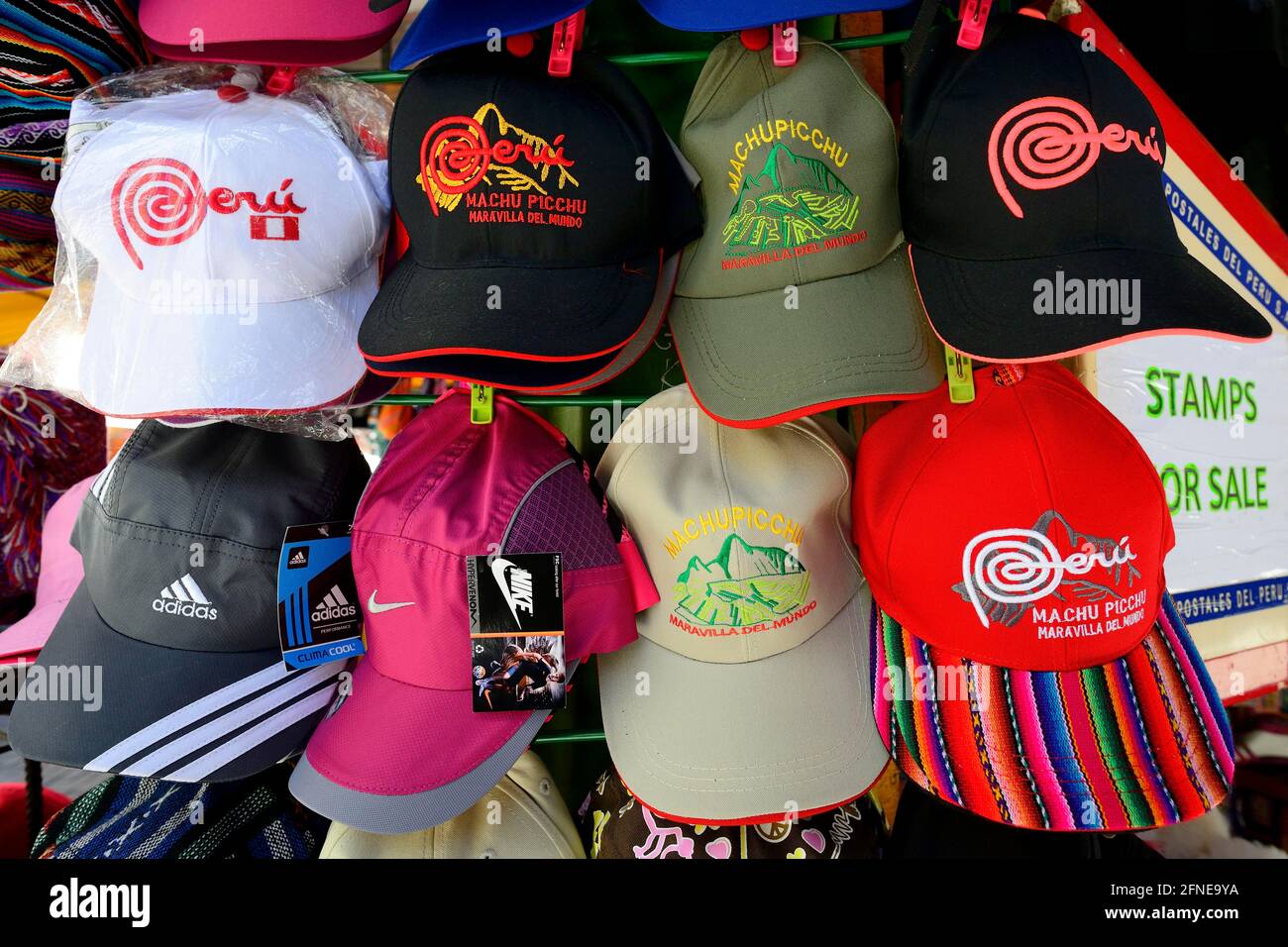 Souvenir stand with umbrella caps, Aguas Calientes, Machu Picchu ...