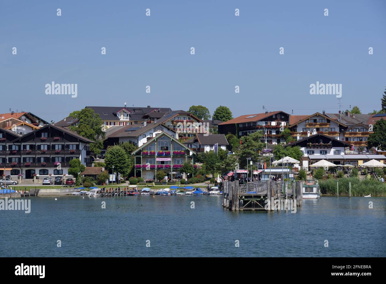 View of Gstadt from the boat, July, Chiemsee, Chiemgau, Bavaria ...