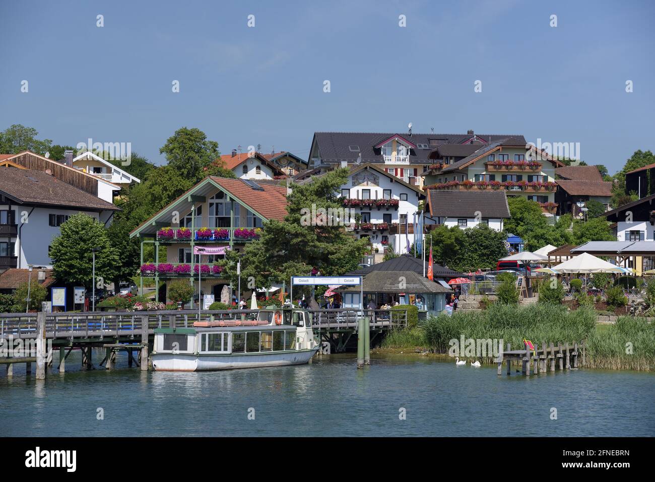 View of Gstadt from the boat, July, Chiemsee, Chiemgau, Bavaria ...