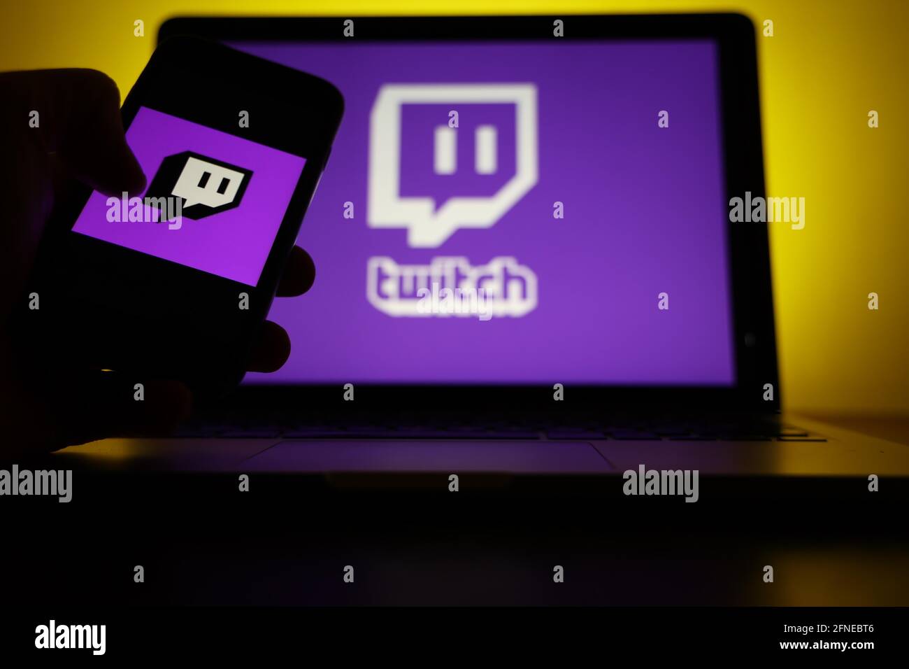 Logo of the streaming platform twitch for gamers on a laptop and a ...