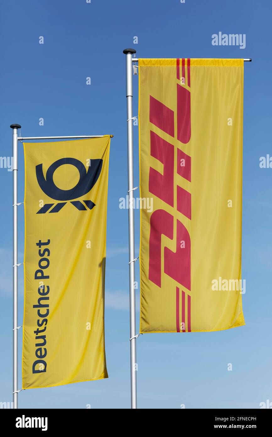 Flags with logos DHL and Deutsche Post, DHL parcel centre Krefeld ...