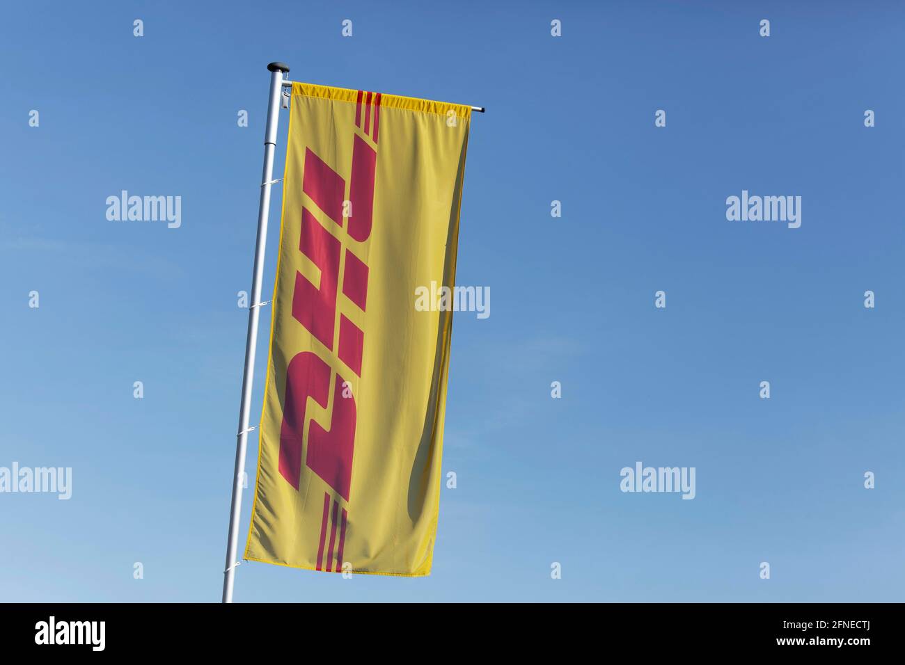DHL, flag with logo, parcel and letter express service, North Rhine ...