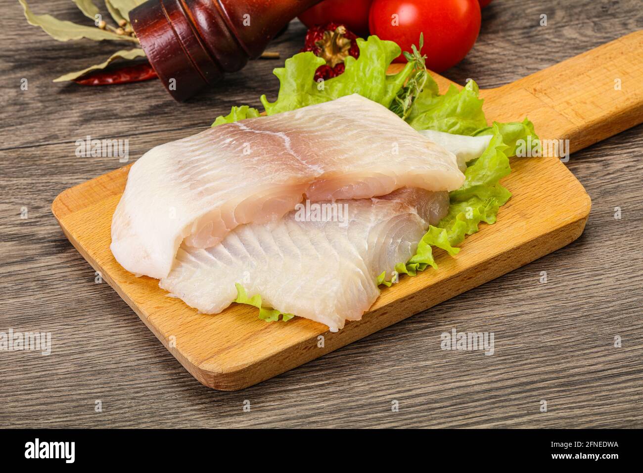 Raw pangasius fillet fish for cooking Stock Photo - Alamy