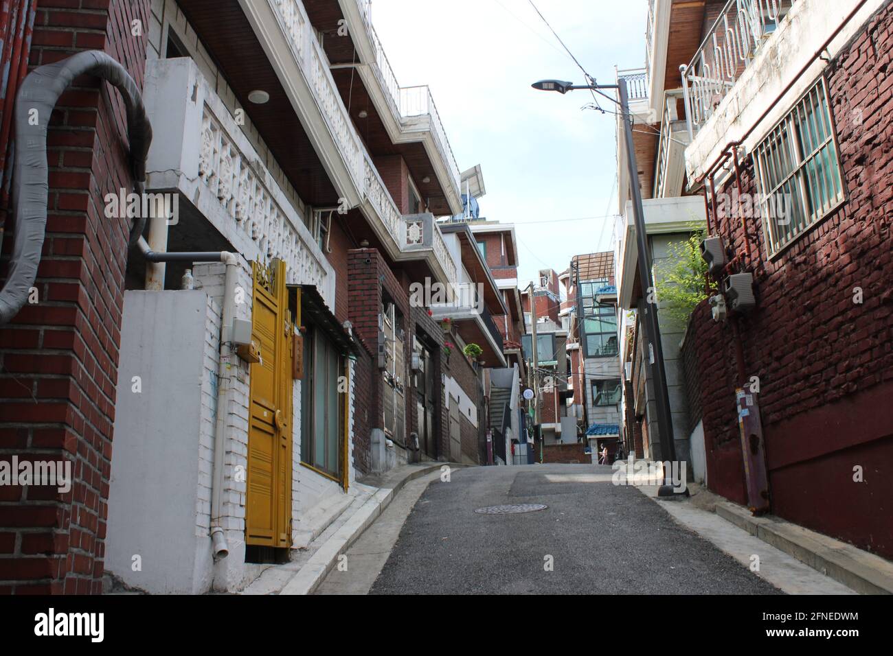 Residential alleyway with traditional-style buildings, in Seoul, Korea ...