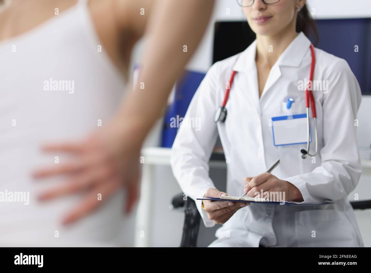 Back pain doctor hi-res stock photography and images - Alamy