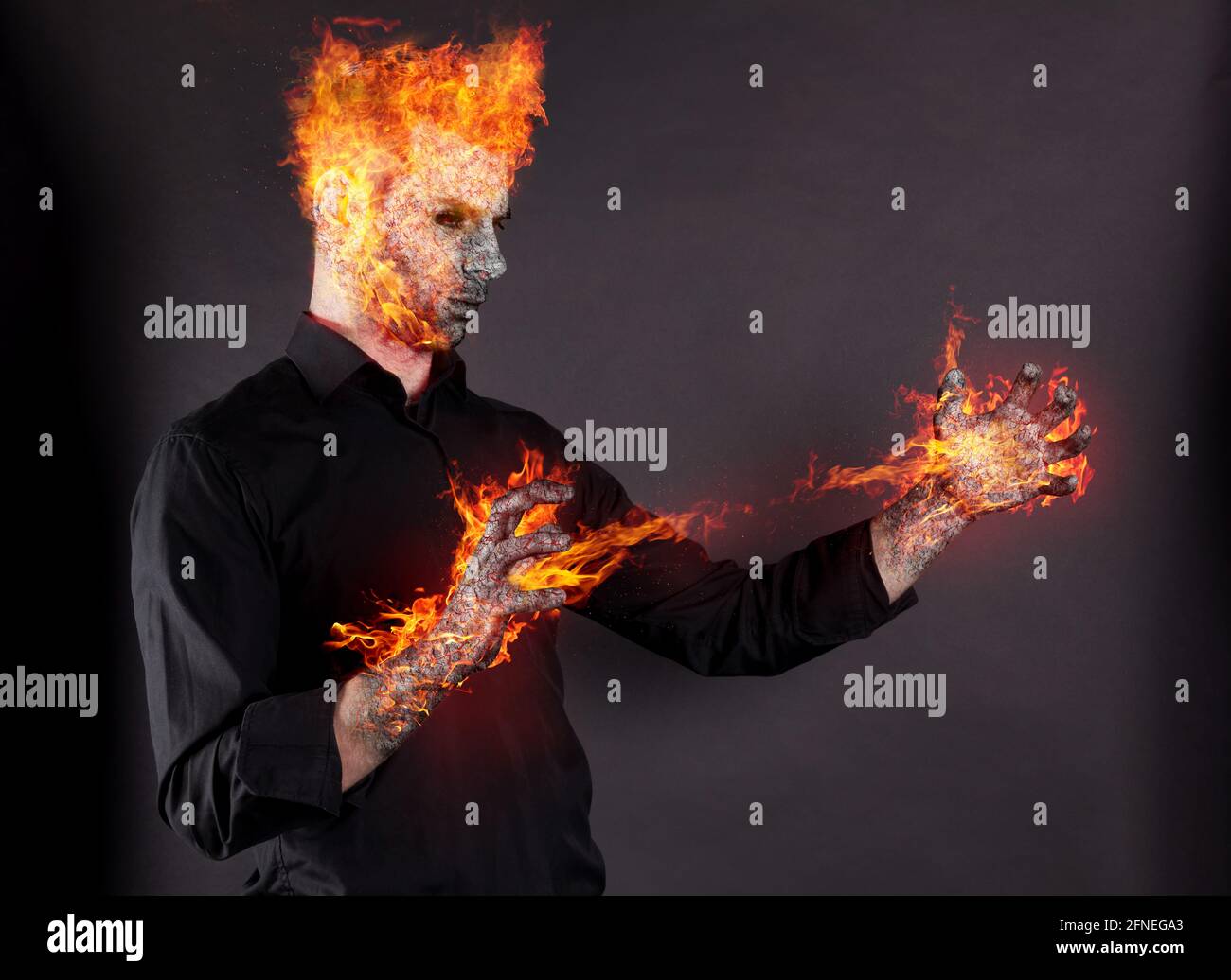 Man transforming, hands and face glowing and burning - Concept of power ...