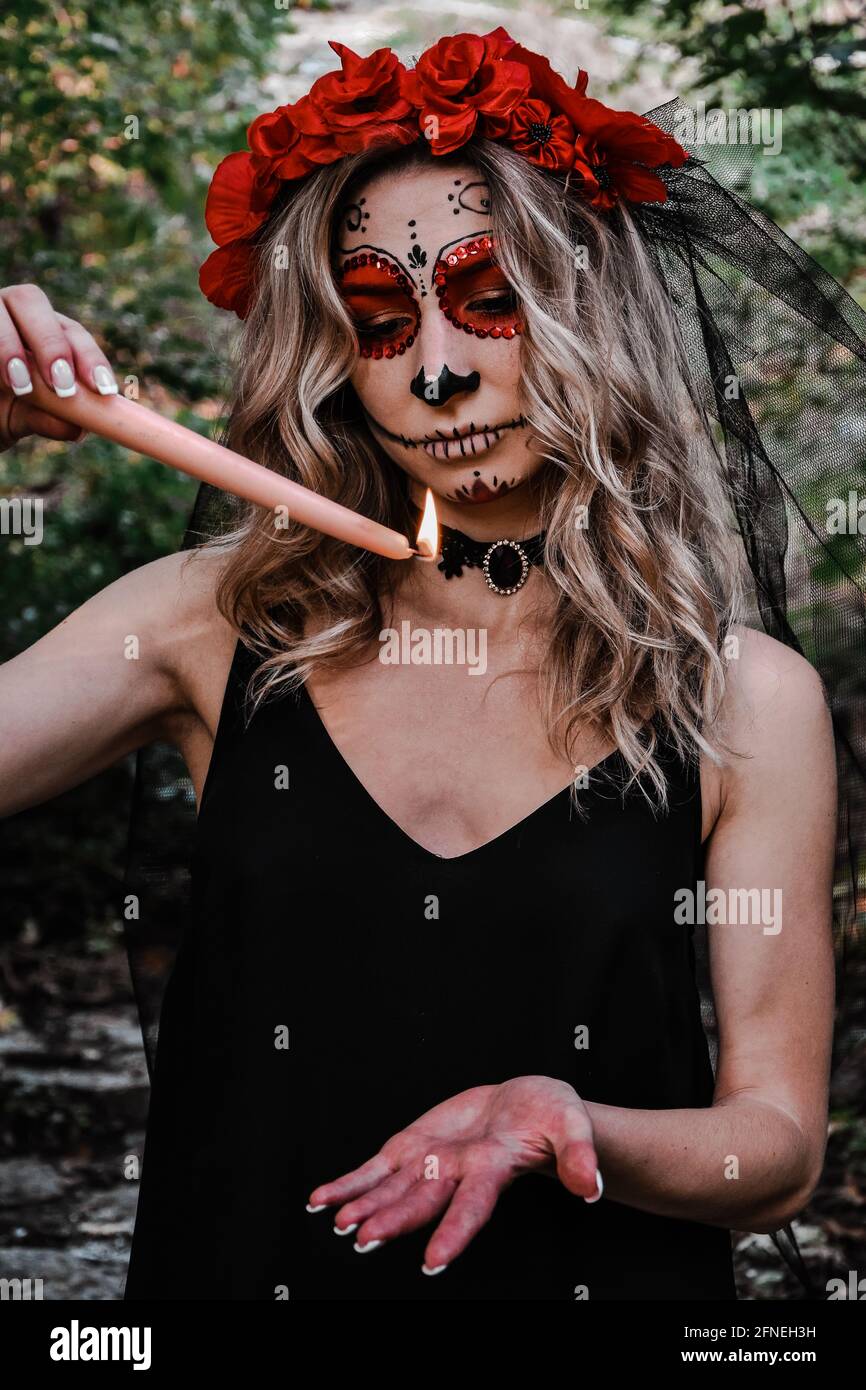 Happy Halloween concept. Scared horrible female in special outfit ...