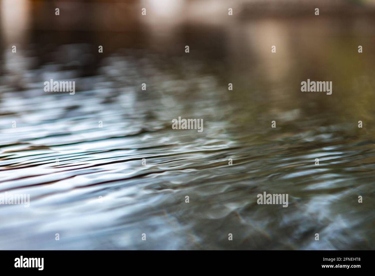Dark smooth water surface in a lake Stock Photo - Alamy