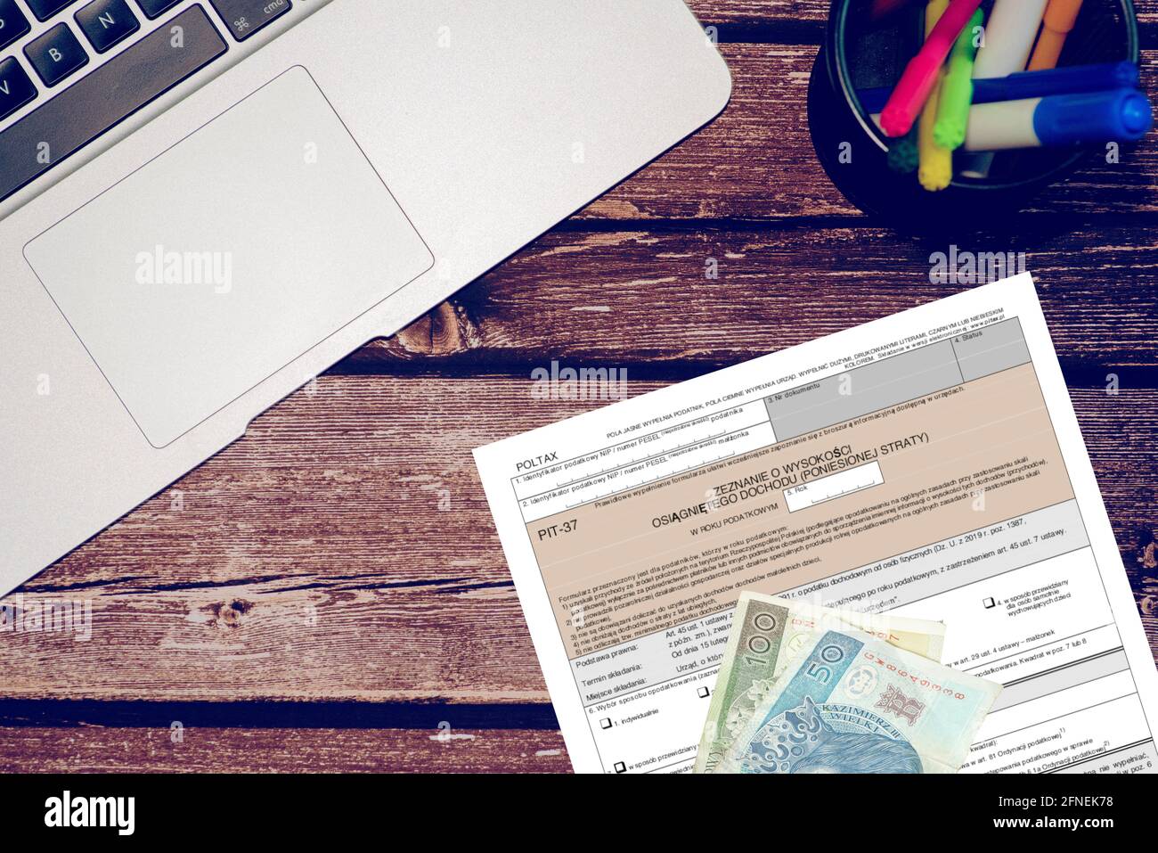 Polish tax return PIT and money Polish zloty Stock Photo - Alamy
